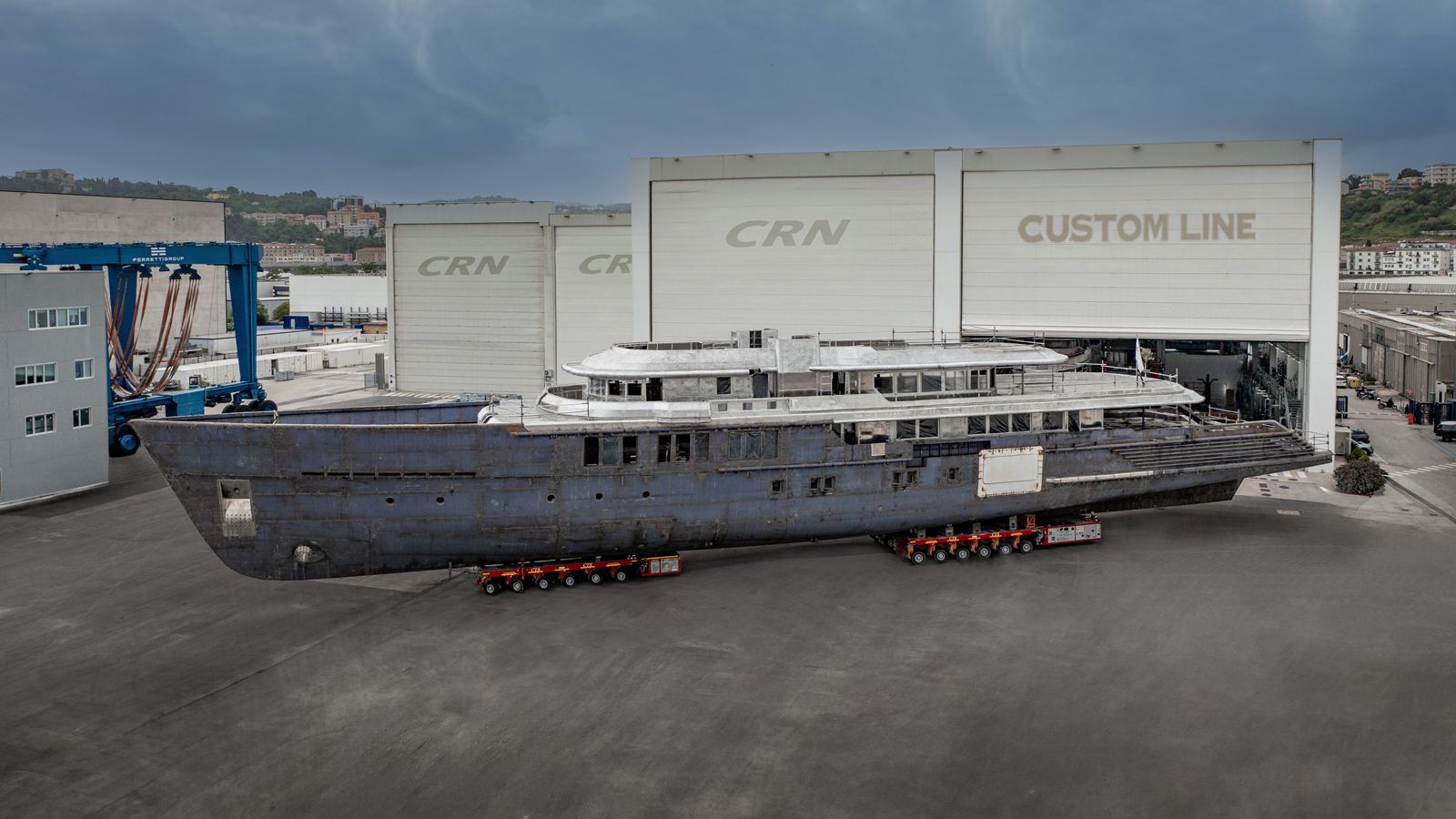 70m in-build CRN yacht Project Thunderball transported to Ancona facility